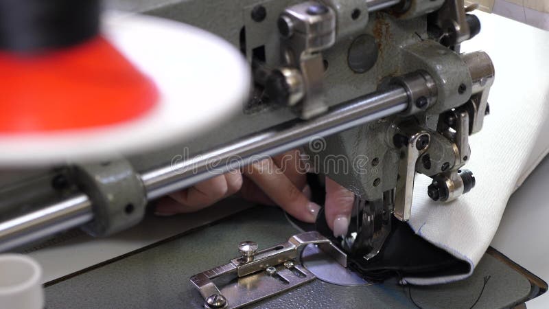 Needle of the Sewing Machine in Motion, Close-up. Needle of the Sewing ...