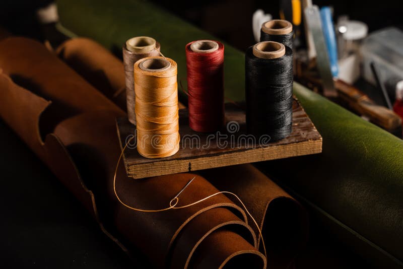 Needle with Spools of Thread on Roll of Brown Genuine Leather in ...