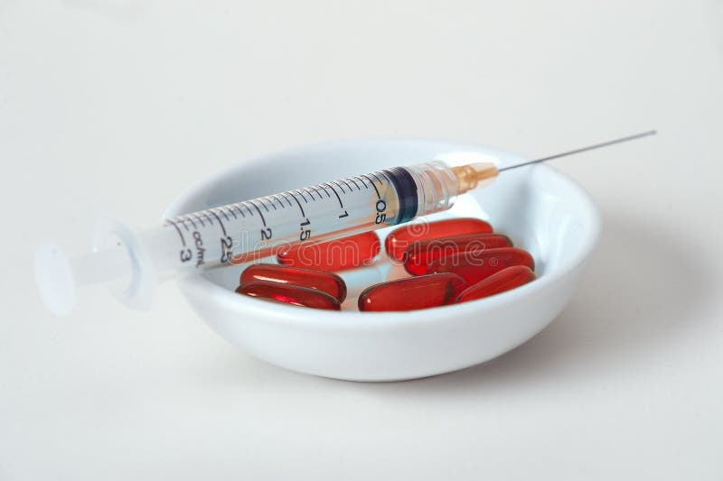 Needle Syringe with Red Pills in Bowl Stock Image - Image of needle ...