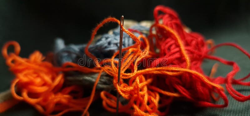 A Needle among Tangled Threads of Fire Stock Image - Image of needle ...