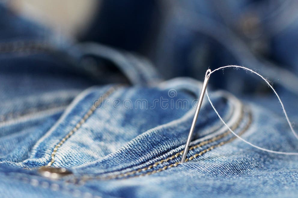 The Needle and Thread on the Jeans Stock Image - Image of dark, jean ...
