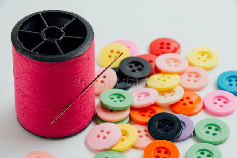 Spool of Thread and Buttons, Sew Instrument Isolated on White Ba Stock ...