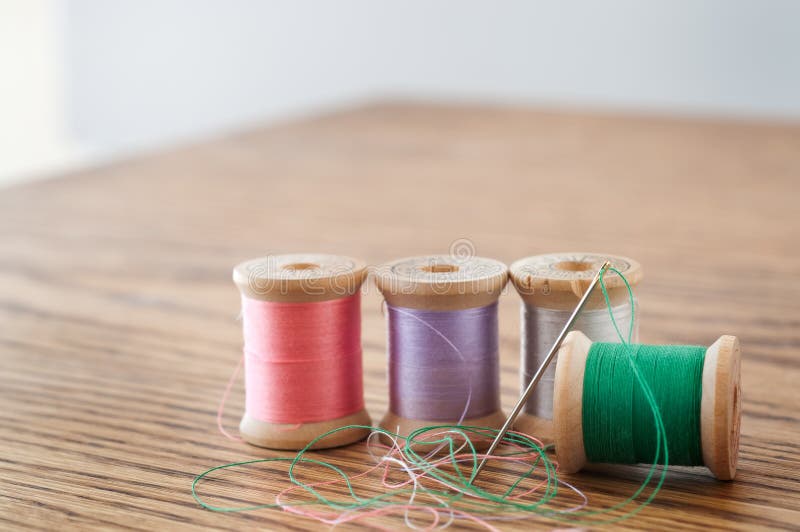 Needle and Thread Still Life Stock Photo - Image of closeup, shallow ...