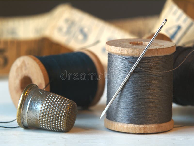 Thimble, needle and thread stock image. Image of tailoring - 210327