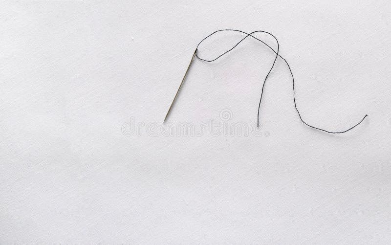 Needle with Thread on White Cloth Top View Stock Photo - Image of ...