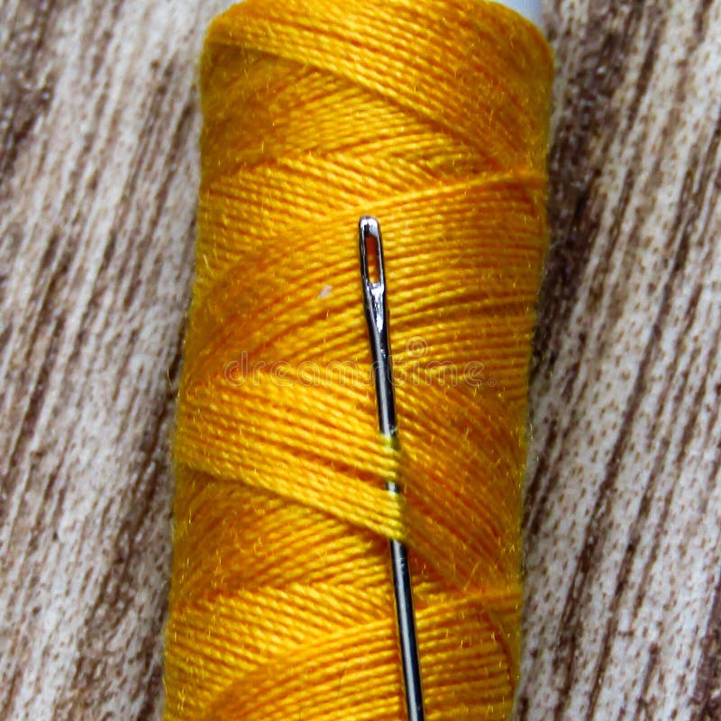 Needle and Thread Close Up Yellow Stock Image - Image of macro, needle ...