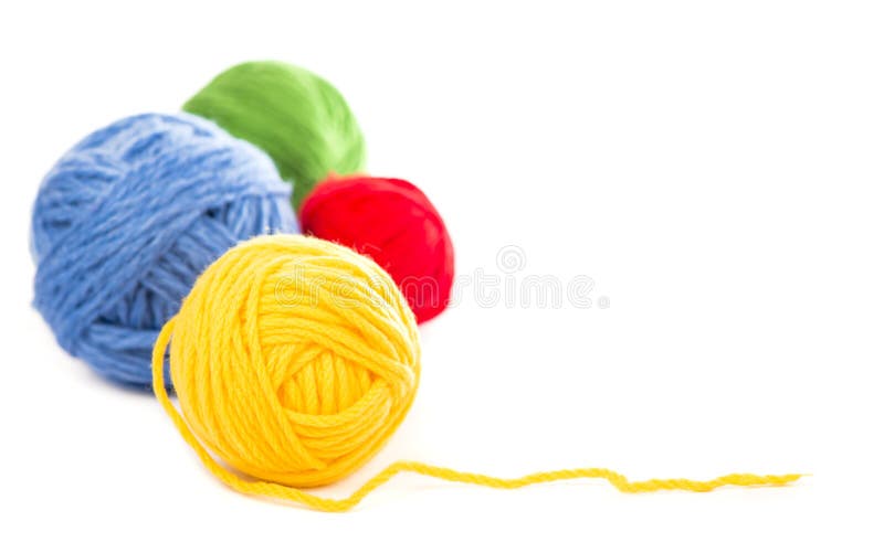 Balls of Blue, Red, and Yellow Woolen Threads on the White Background ...