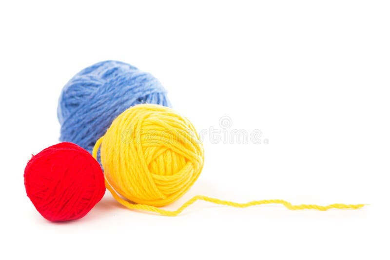 Balls of Blue, Red and Yellow Woolen Threads on the White Background ...