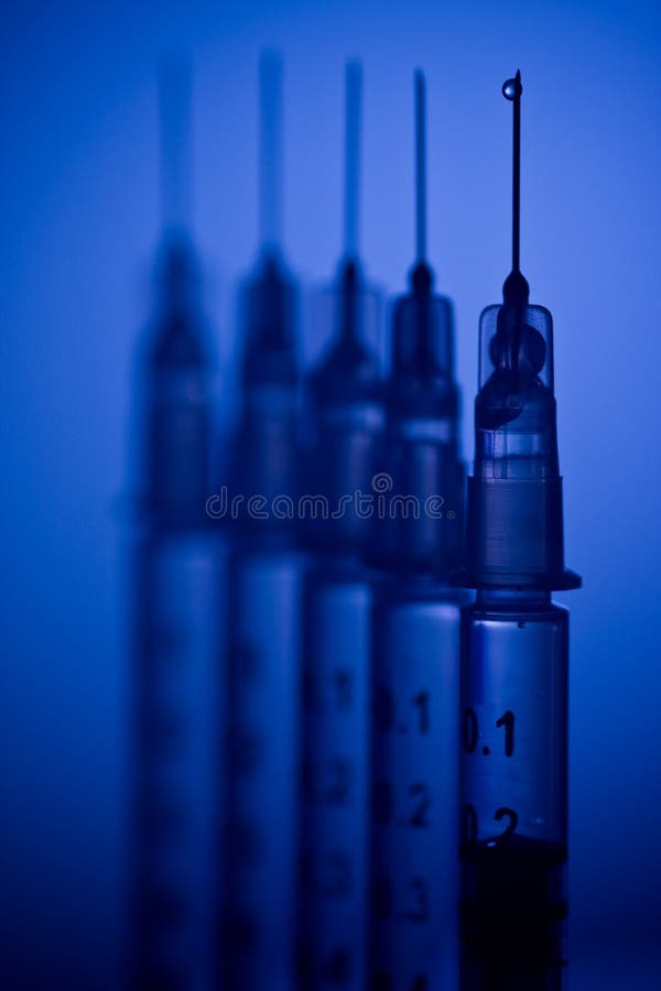 Needles Ready for Injection Stock Photo - Image of injection, blue: 5360844