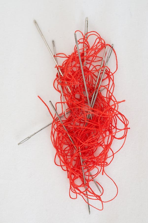 Red Tangled Thread and Button Stock Photo - Image of hobby, detail ...