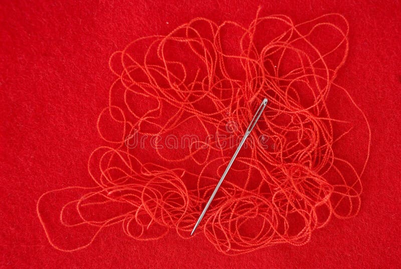 Needles and red thread stock photo. Image of line, decoration - 32096932