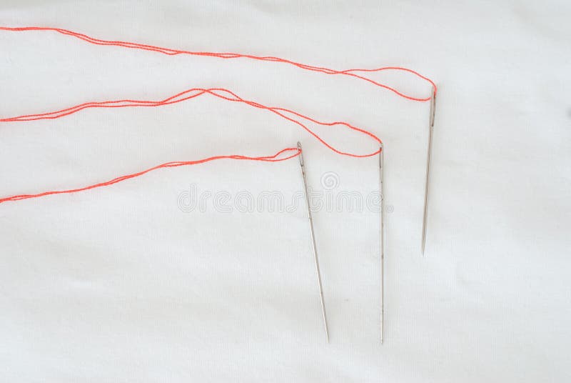 Red Tangled Thread and Button Stock Photo - Image of hobby, detail ...