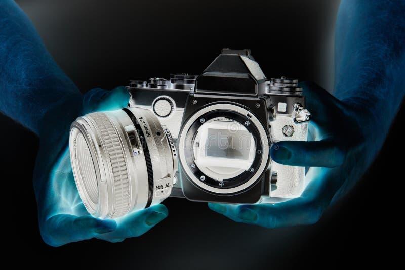 Negative Photo of SLR Camera in Hands Photographer Closeup Stock Photo ...