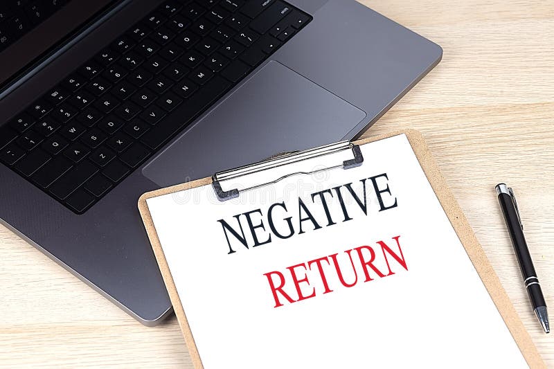 NEGATIVE RETURN I Text on Clipboard on Laptop Stock Image - Image of ...