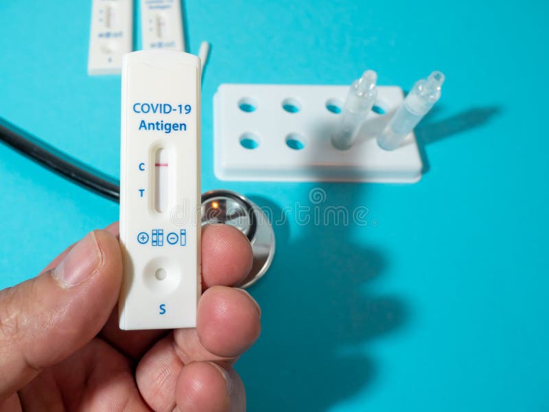 Negative Test Result Using COVID-19 Rapid Testing Device. Stock Photo ...