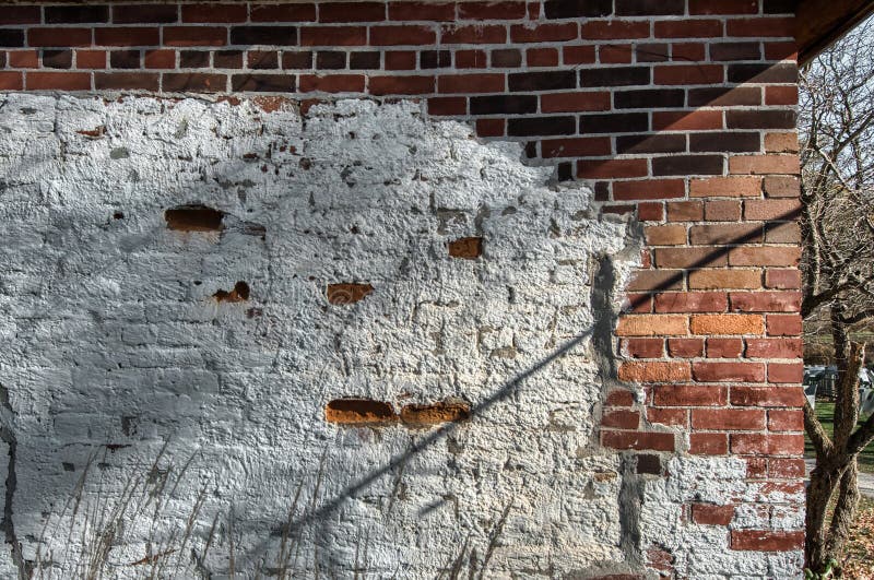 Neglected Brick Wall with Missing Bricks Stock Image - Image of shadow ...
