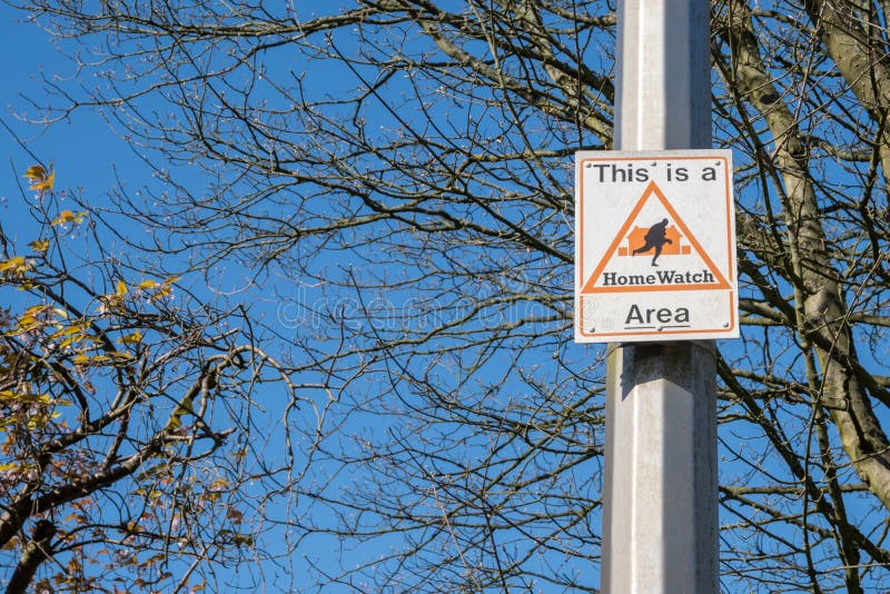 A Neighbourhood Watch Scheme Warning Sign on a Lamppost Stock Photo ...
