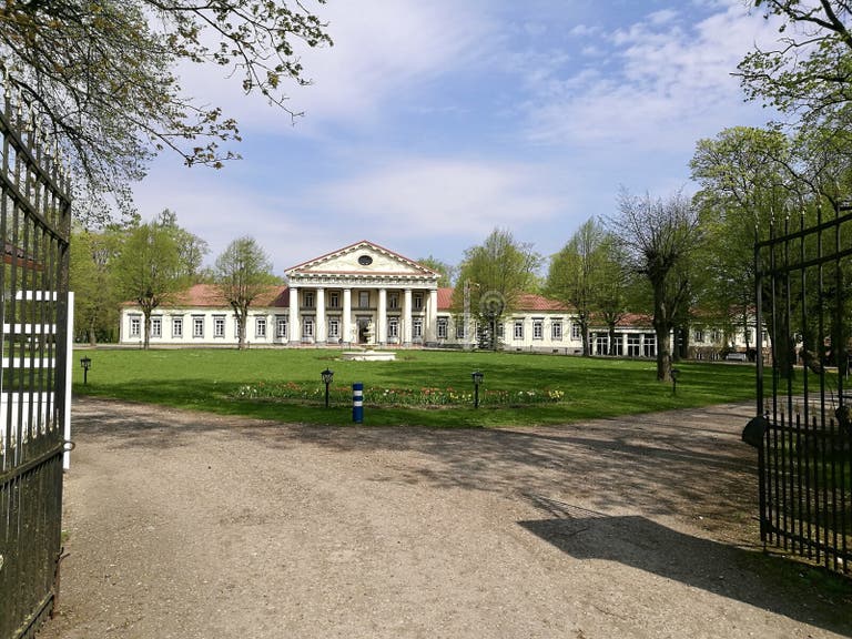 Taujenai manor and park stock image. Image of tiles - 374492309