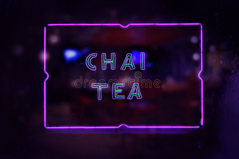 Neon Chai Tea Sign in Rainy Window Stock Photo - Image of beverage ...
