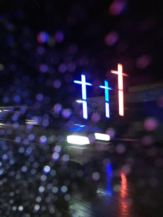 Neon Cross on the street stock photo. Image of three - 262051946