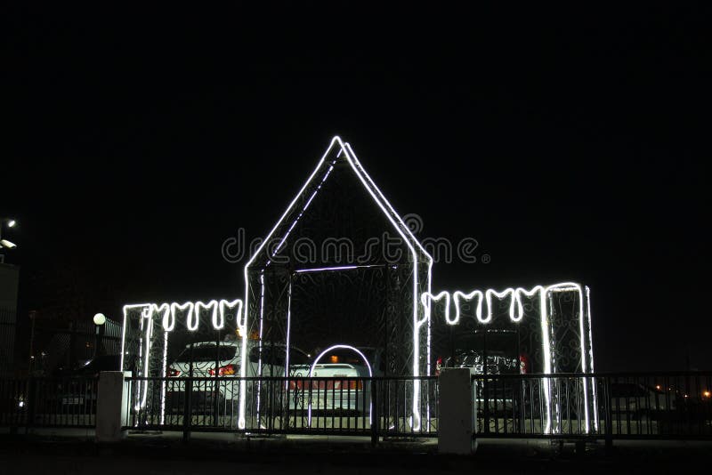 Neon gate lighting stock photo. Image of christmas, skyline - 203241636