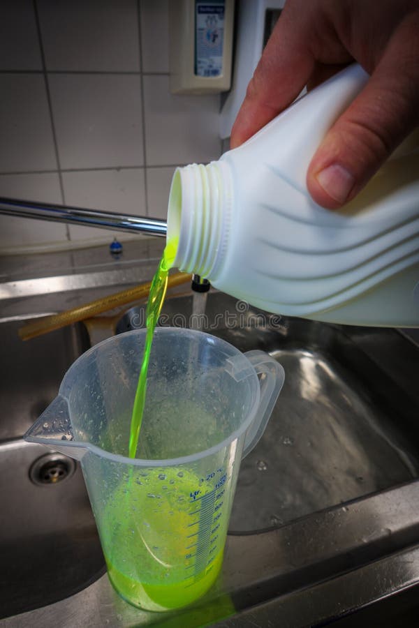 Neon Green Liquid is Put into a Water Bath Stock Photo - Image of ...