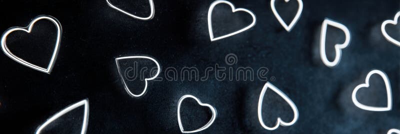 Neon Hearts Floating Against a Dark Moody Background Creates a Striking ...
