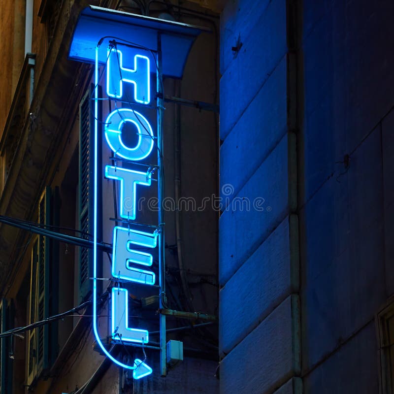 Neon hotel sign stock image. Image of evening, outdoors - 153544305