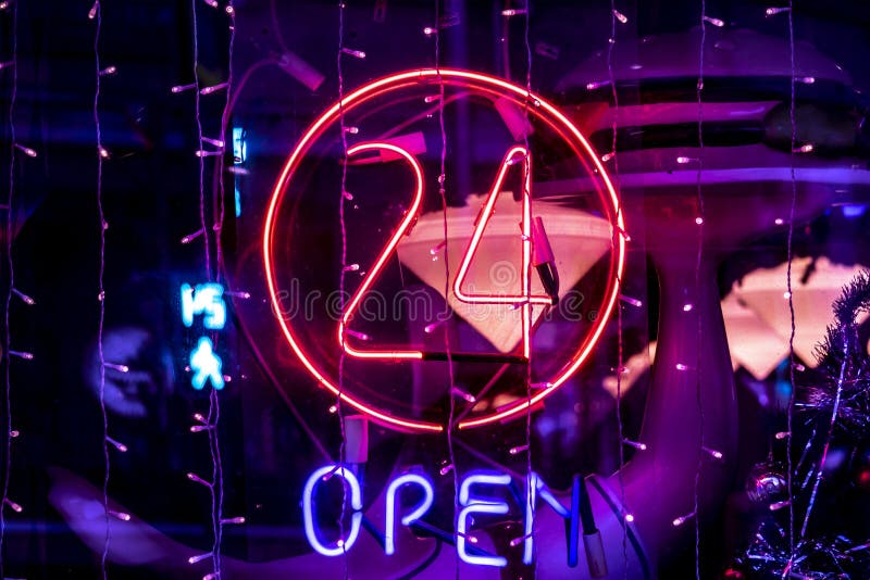 Neon 24 Hours Open Logo Sign Glowing in the Bar Store F Stock Photo ...