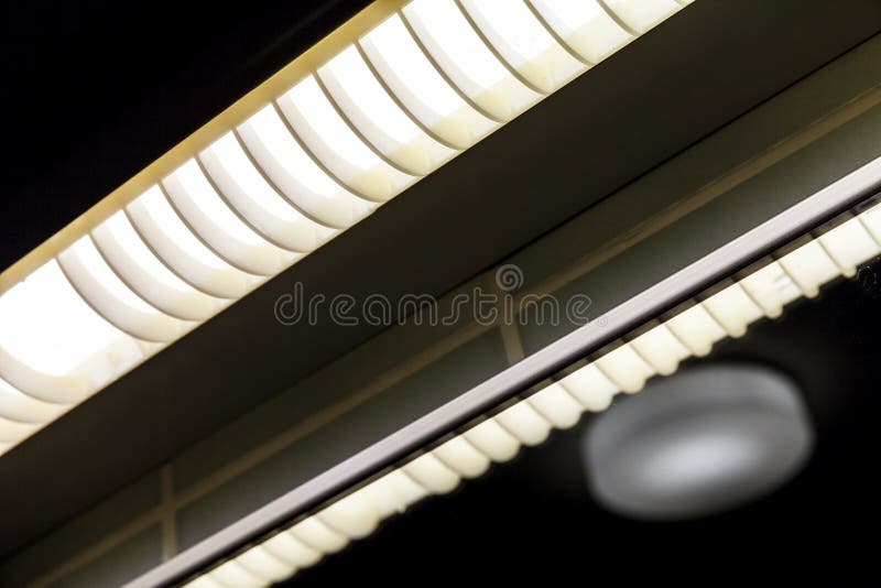 Neon Lamps Glowing Over Dark Ceiling Stock Photo - Image of design ...