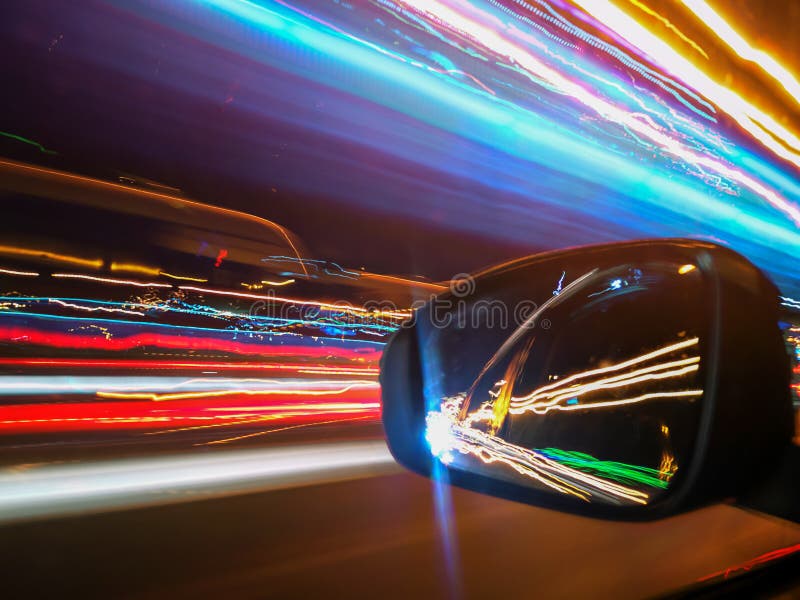 Neon Lanes and Car& X27;s Reflection in Rear View Mirror Stock Photo ... Neon Lanes and Car& X27;s Reflection in Rear View Mirror Stock Photo ...