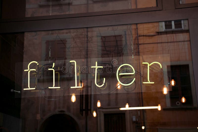 Neon Light Sign "filter" on the Glass Facade of a Ca Editorial Stock ...