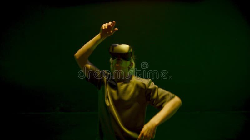 Neon Lights Gamer Dancing in Virtual Reality Headset. Energetic Man ...