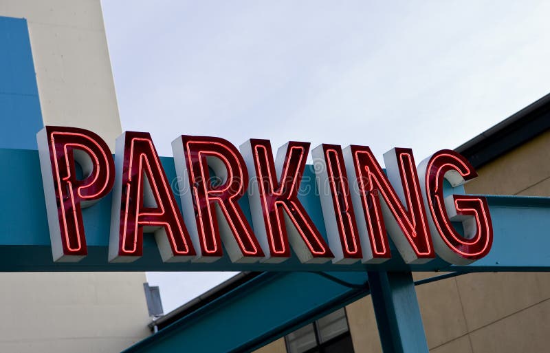 Neon Parking Sign stock photo. Image of garage, light - 7797662