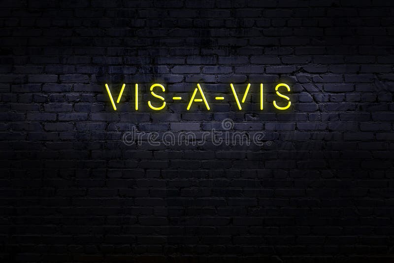 Night View of Neon Sign on Brick Wall with Inscription Vis-a-vis Stock ...
