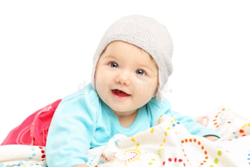 Bambina Con Cappello Sdraiata E Sorridente Fotografia Stock - Immagine ...