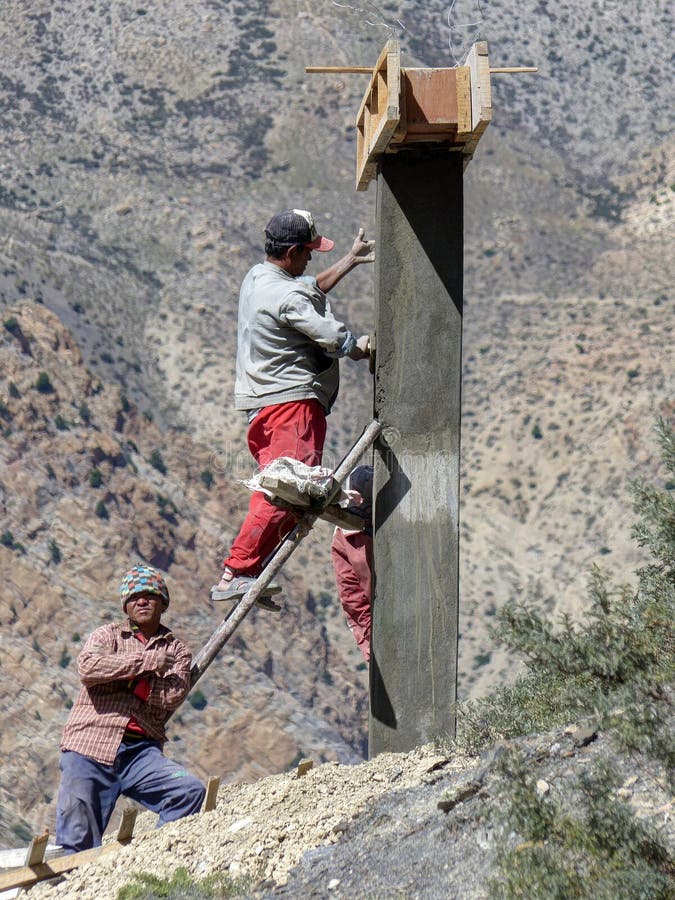 Construction Workers Building Concrete Structure in Mountainous Nepal ...