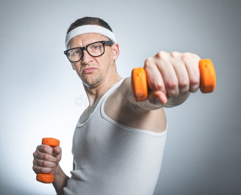 Funny Weak Man Lifting Biceps Stock Photo - Image of sport, lift: 65838156