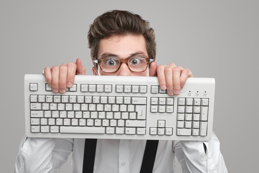 Nerd in Glasses with Keyboard in Studio Stock Photo - Image of clever ...