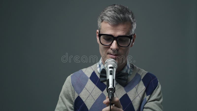 Nerd Guy Adjusting the Microphone before Giving a Speech Stock Video ...