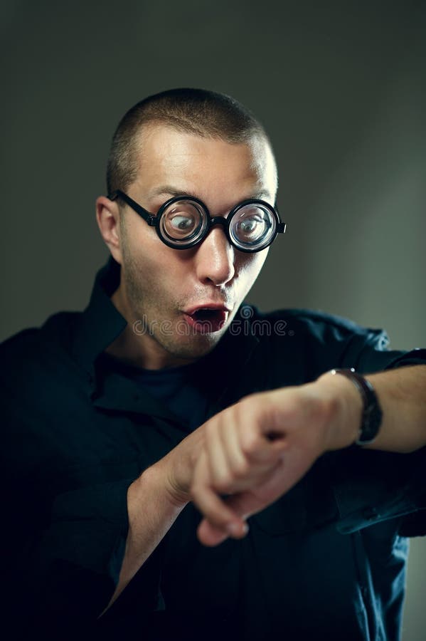 Nerd Guy Looking at Watches Stock Image - Image of looking, adult: 42019485