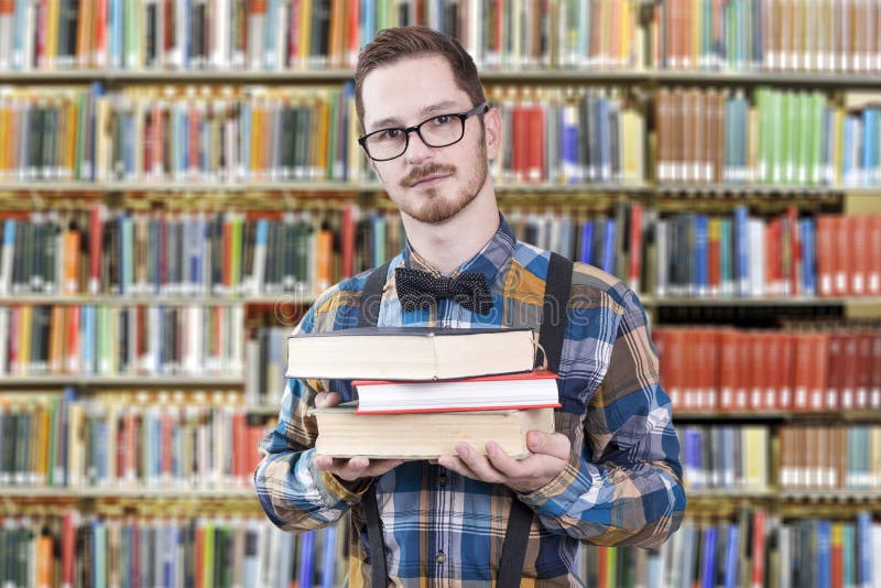 Nerd in library stock photo. Image of student, nerd, learn - 66483342