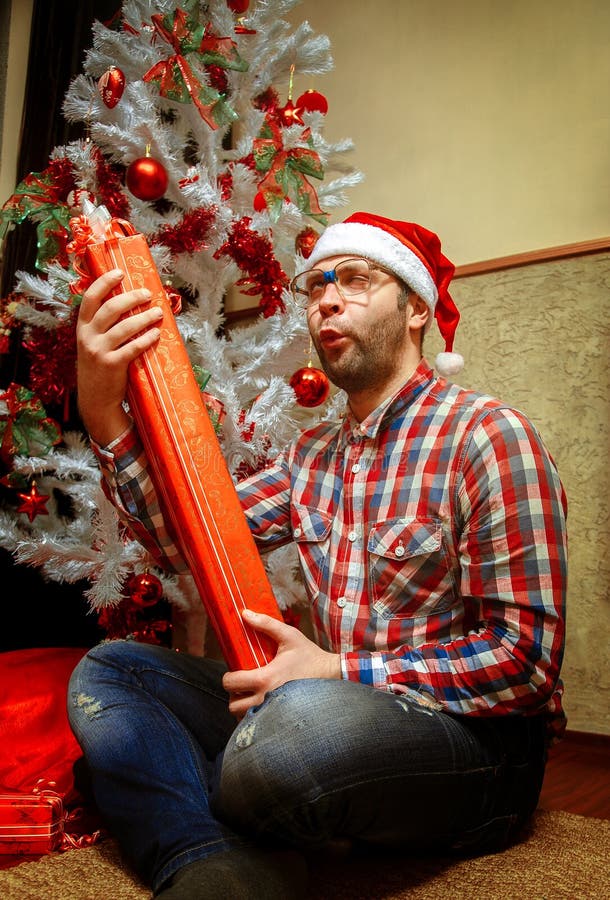 Nerd Playing with His Long Christmas Present Stock Photo - Image of ...