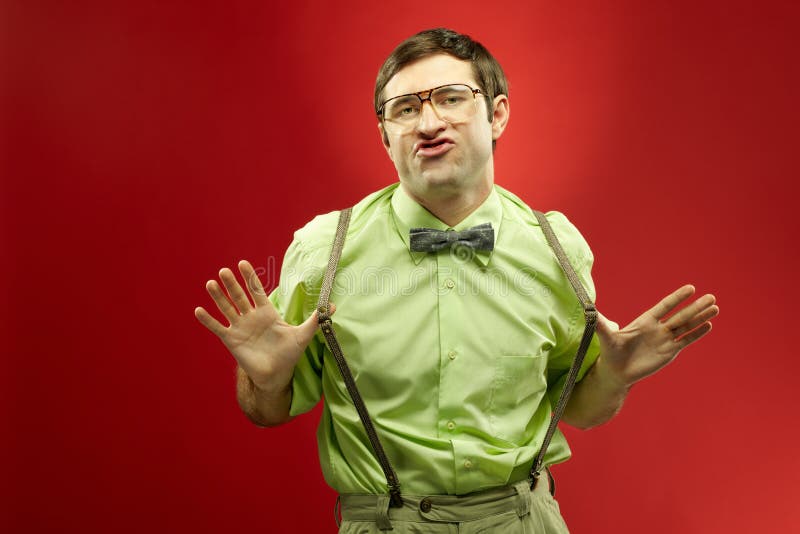 Nerd showing off stock photo. Image of grimacing, macho - 78189926
