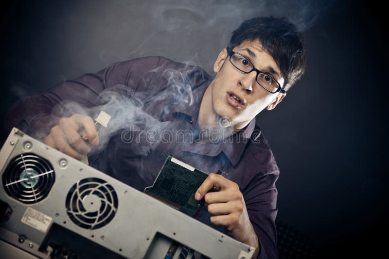 Nerd with Smoke Coming Out of His Pc Stock Photo - Image of shocked ...