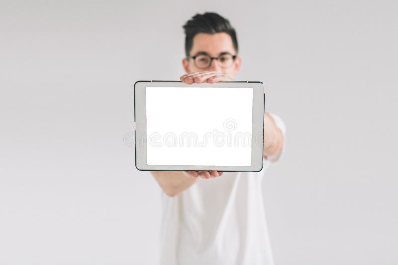 Nerd is Wearing Glasses Holds the White Empty Screen Tablet Device ...