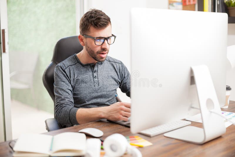 Nerdy Graphic Designer in Front of a Computer Stock Image - Image of ...
