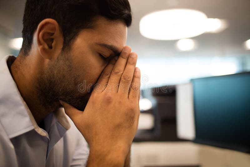 Nervous Businessman Peeking Over Desk Stock Image - Image of adult ...