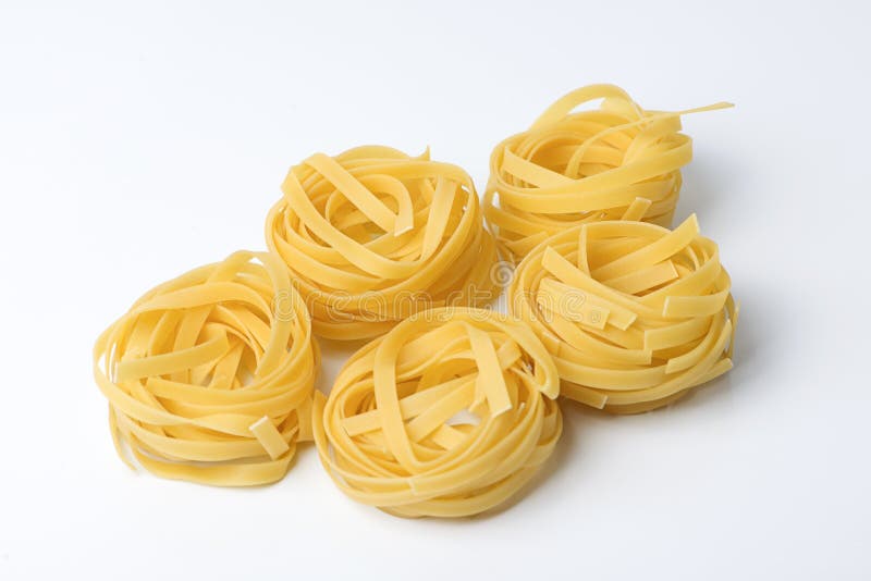 Nest-shaped Raw Dried Pasta. Horizontal Studio Shot Stock Photo - Image ...