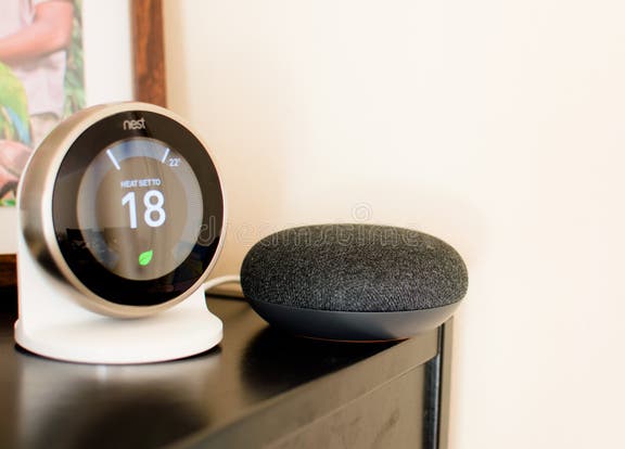 Nest Smart Thermostat and Google Home Mini Speaker Editorial Stock ...